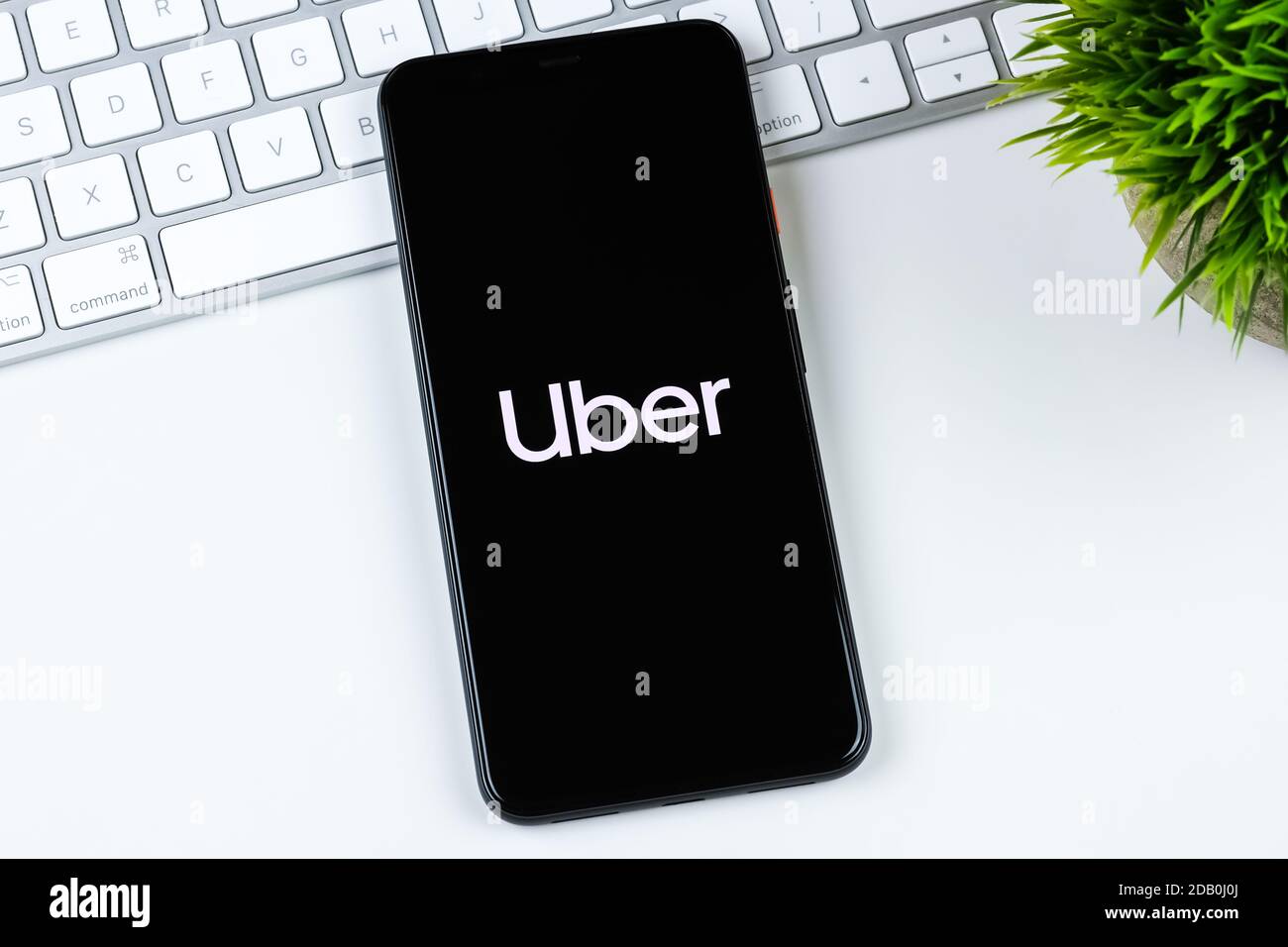 Uber app logo on a smartphone screen Stock Photo - Alamy