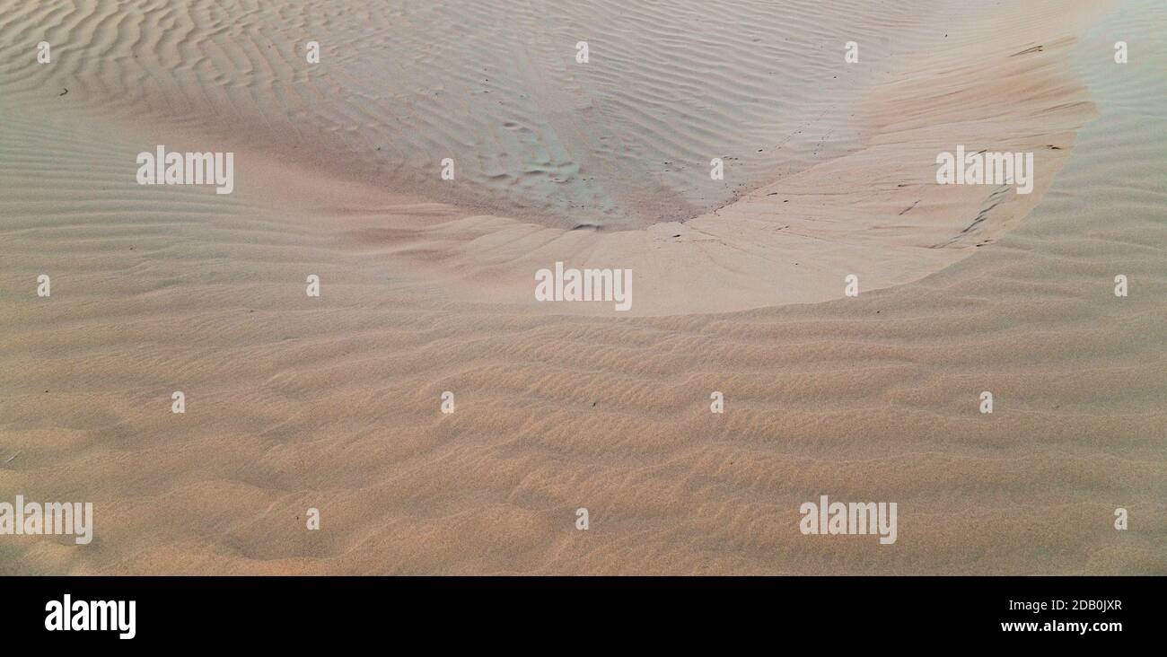 Rippled sand in beach. Beautiful sand background Stock Photo - Alamy