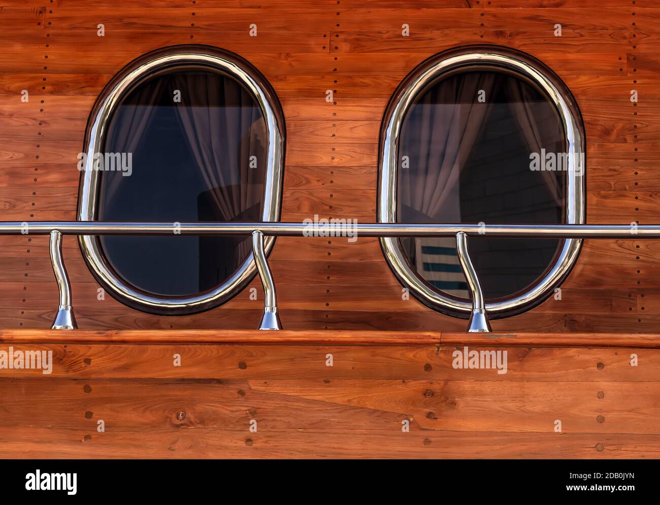Cruise yacht frame ship porthole on wooden wall Stock Photo - Alamy