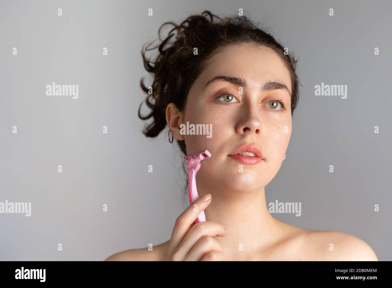 A single hair tweezers hi-res stock photography and images - Alamy
