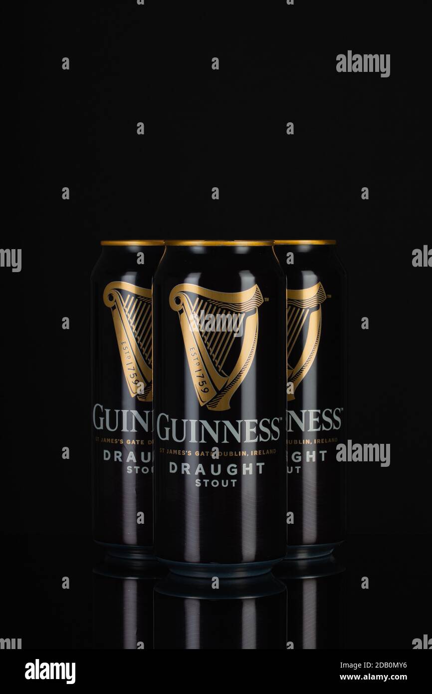 Prague,Czech Republic - 12 November,2020:Guinness cans on the black ...