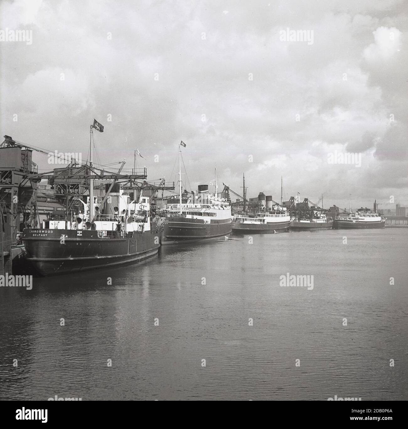 1950s, steam ships moored in the harbour at Belfast docks, Northern ...