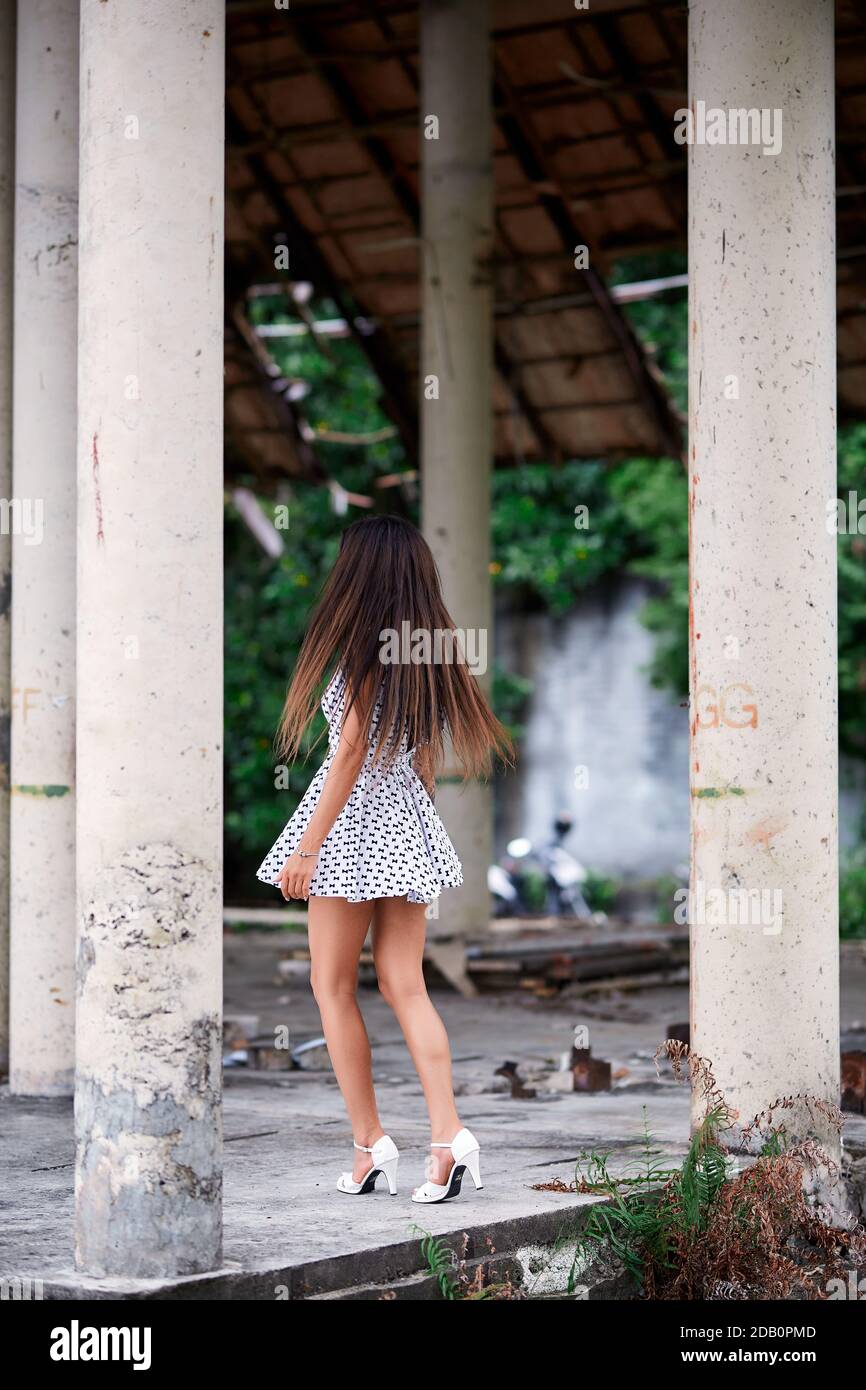 Beautiful girl posing in the abandoned ruined building Stock Photo - Alamy