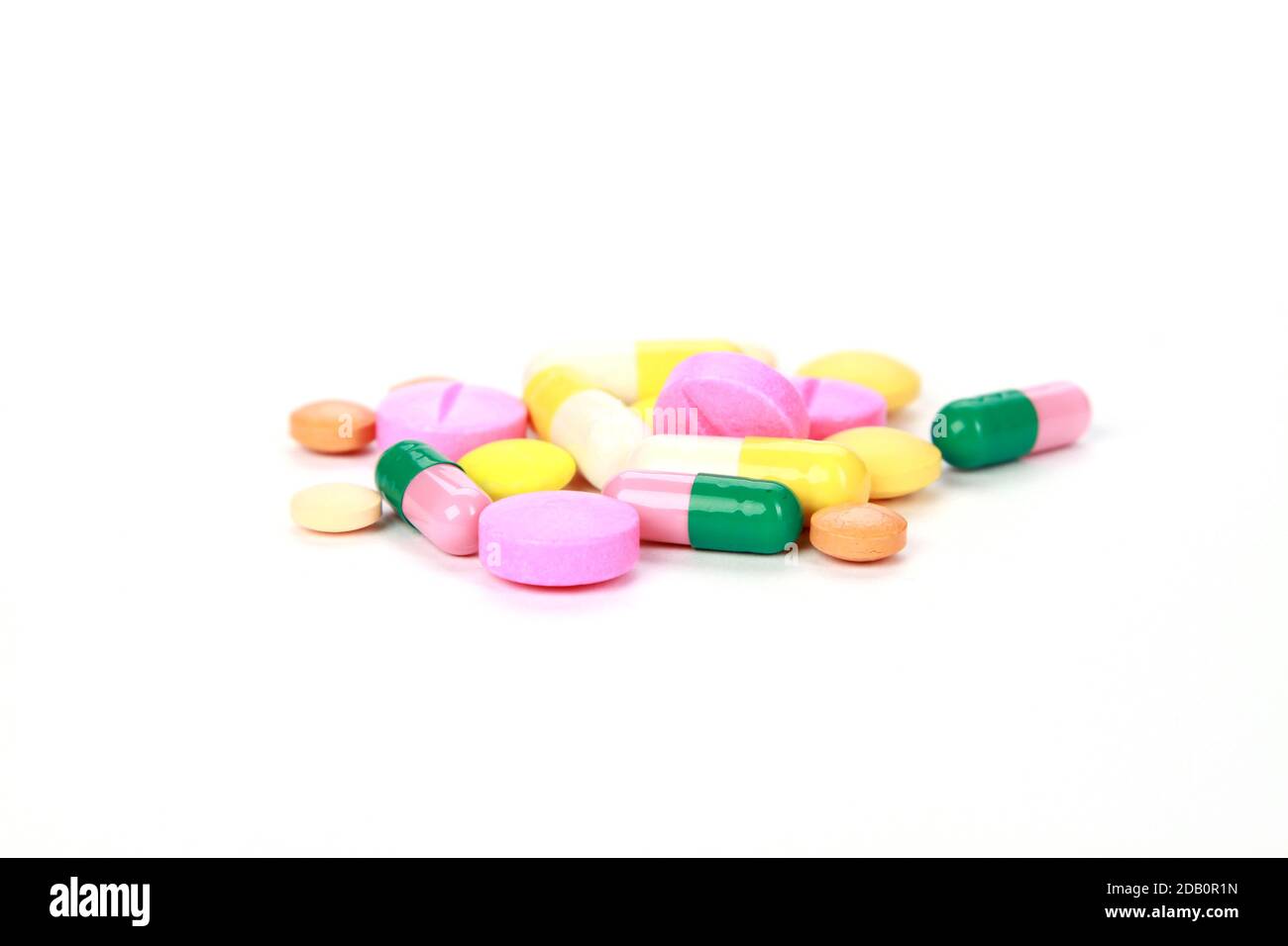 A closeup shot of colorful tablets isolated on white background Stock ...