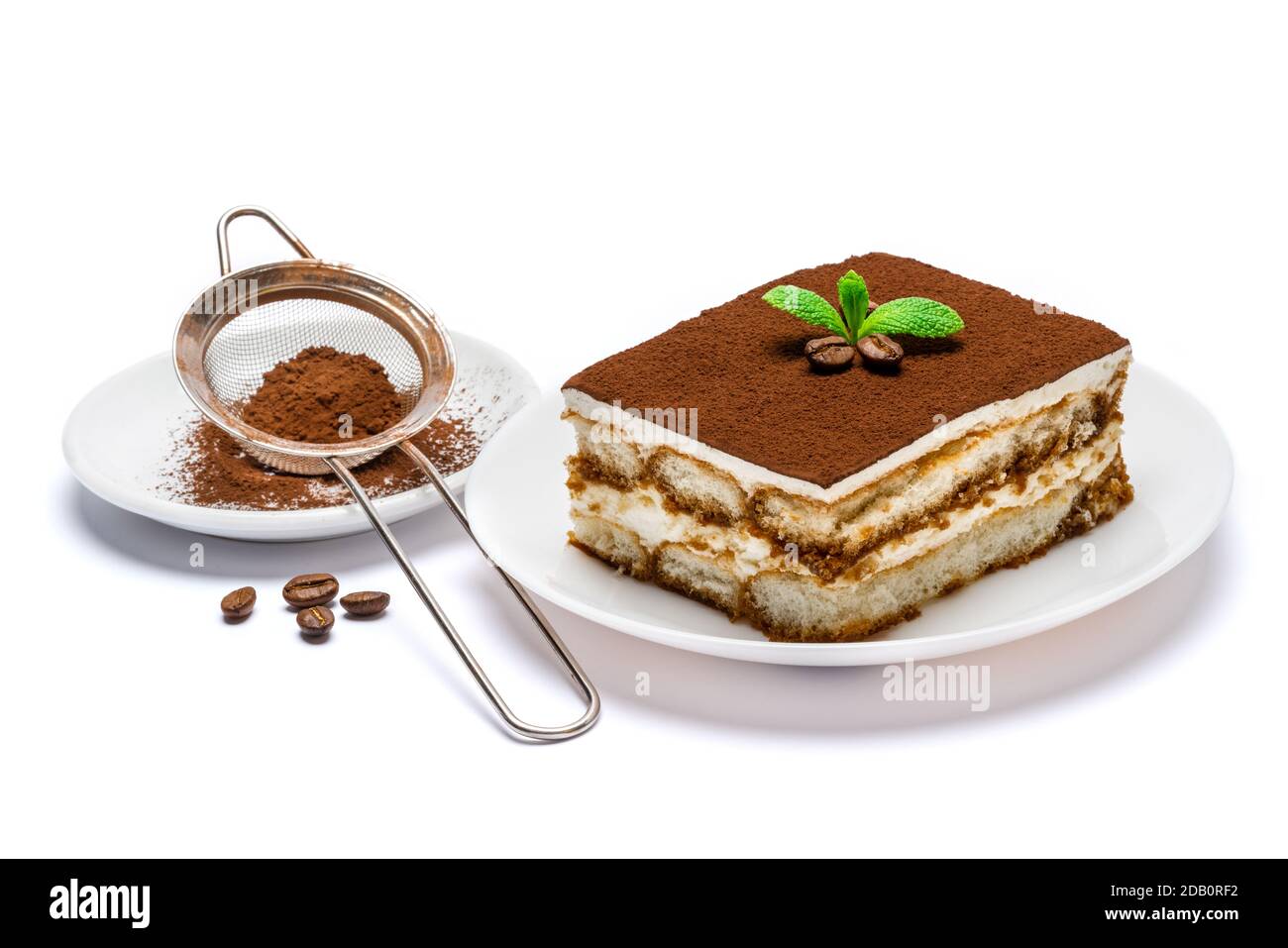 Traditional Italian Tiramisu square dessert portion on ceramic plate ...