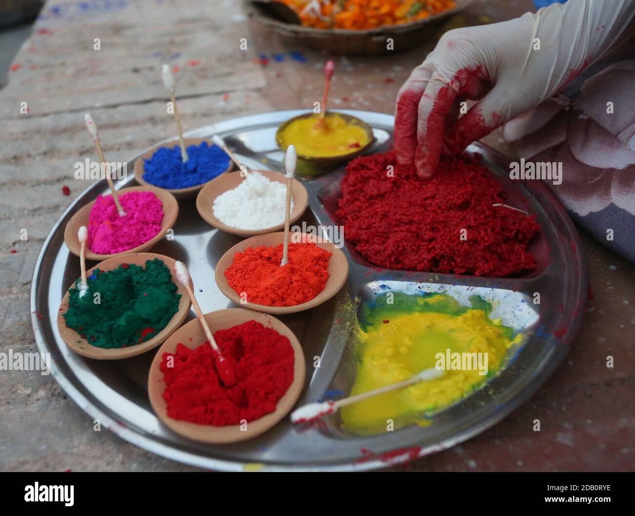 Kathmandu, Nepal. 16th Nov, 2020. A girl with hand gloves waits for ...