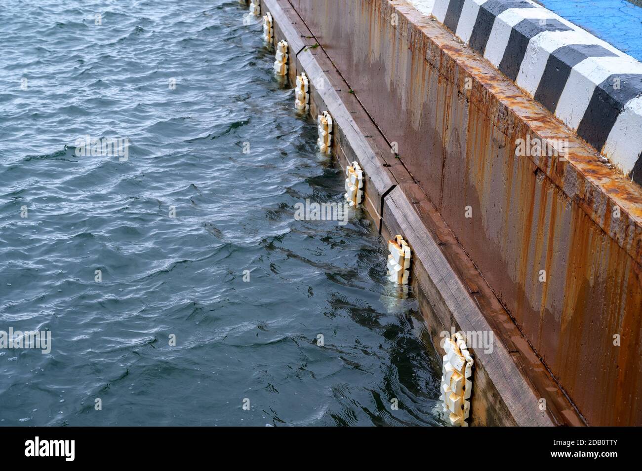 Mooring fenders on the pier. Protection against impact Stock Photo - Alamy