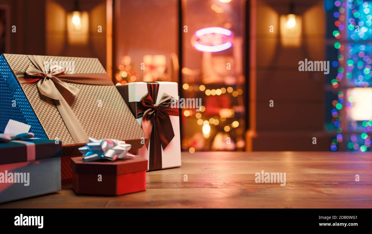 Christmas shopping and colorful gifts, open shops in the background ...