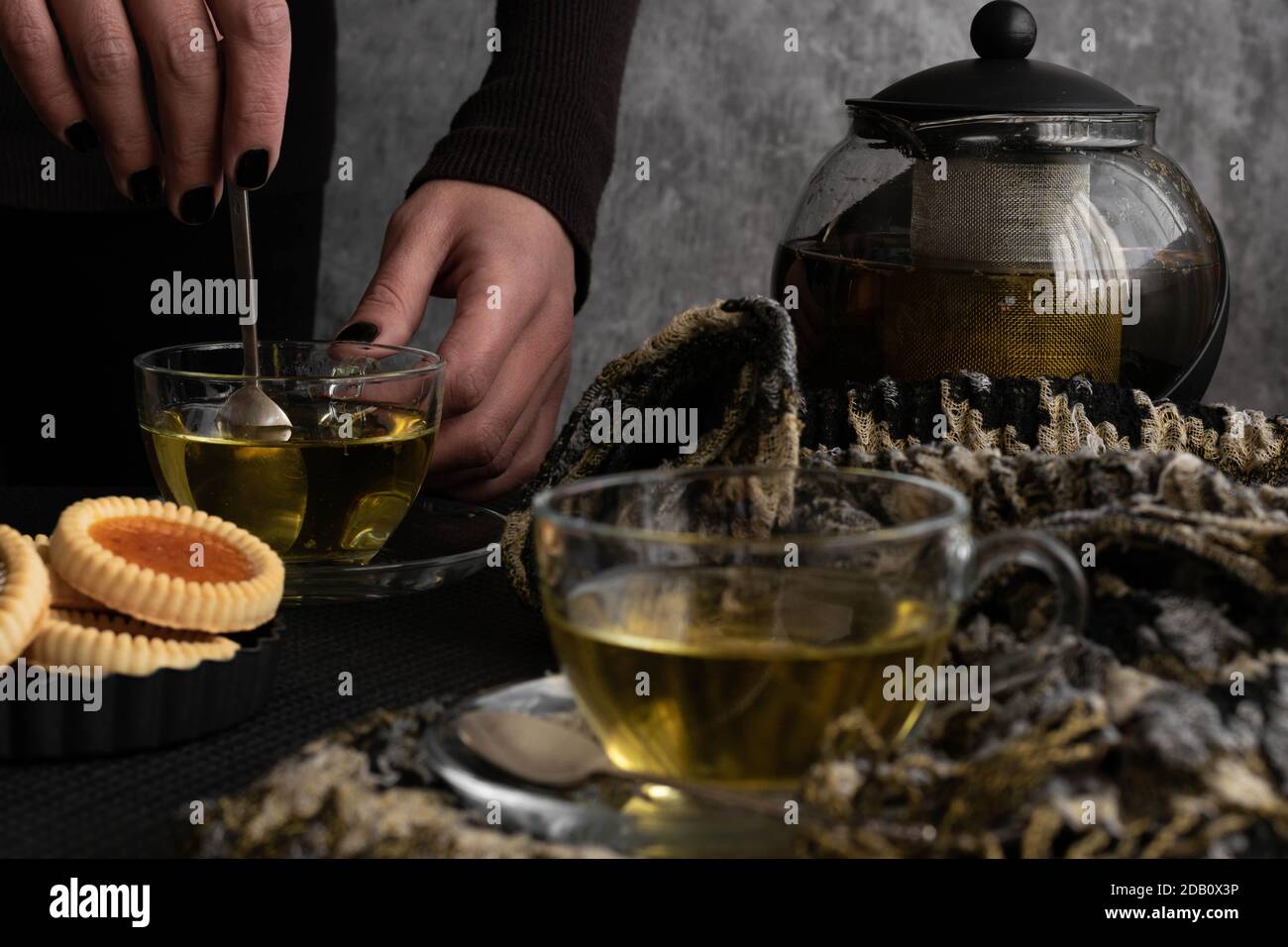 Woman pouring tea glass hi-res stock photography and images - Alamy