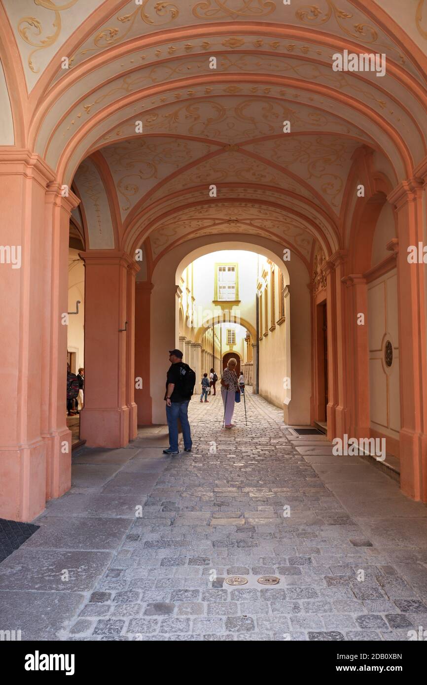 People walking through and arch at the Melk Abbey in Melk,Austria Stock ...