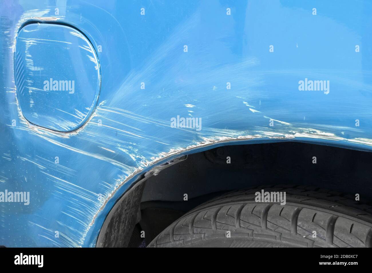 Scratches on the side of the red car. Collision or accident Stock Photo ...