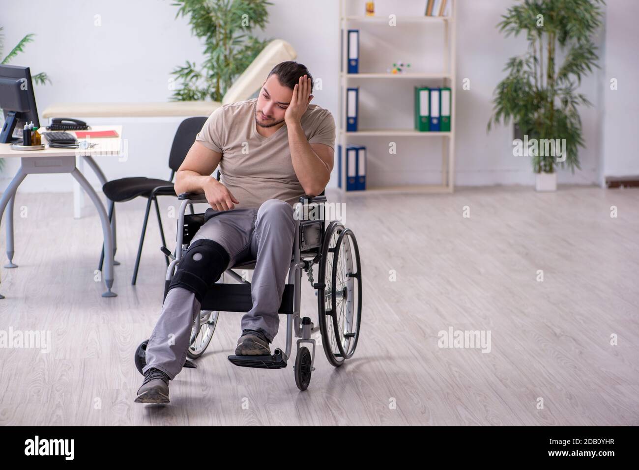 Wheel chair broken leg hi-res stock photography and images - Alamy