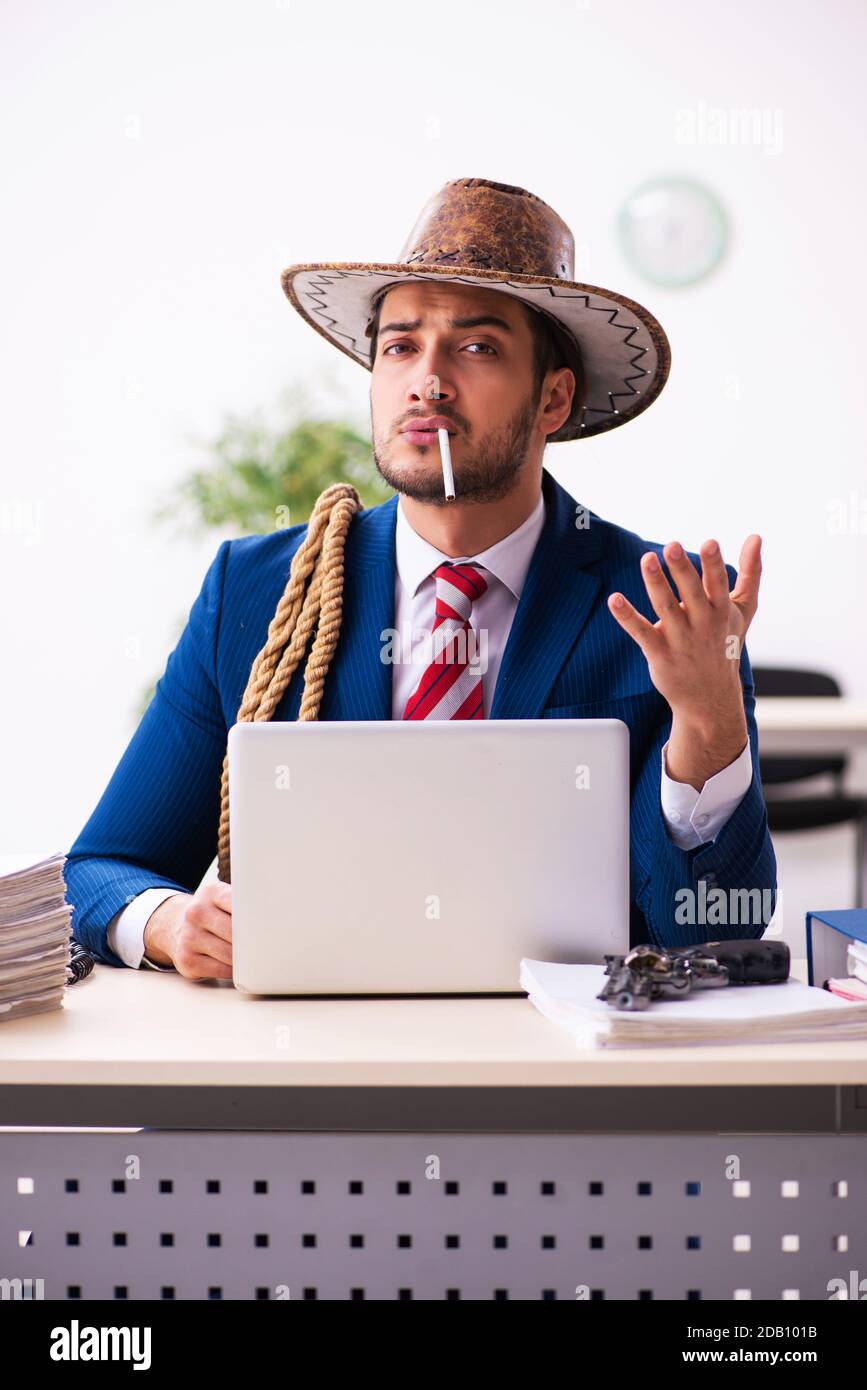 Young cowboy smoking cigarette hi-res stock photography and images - Alamy