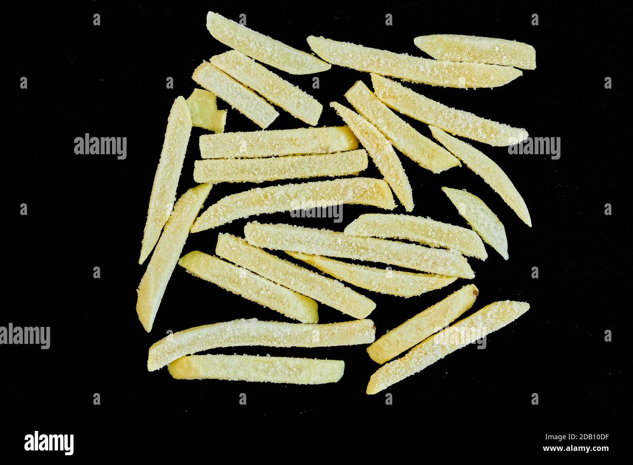 French fries, small, raw and frozen Stock Photo - Alamy