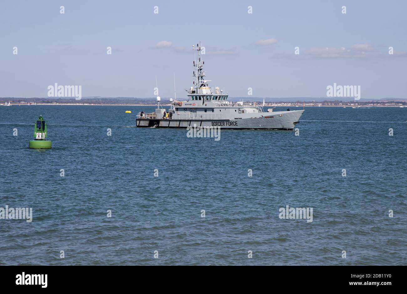 a uk border force patrol ship entering the harbour at cowes on the isle ...