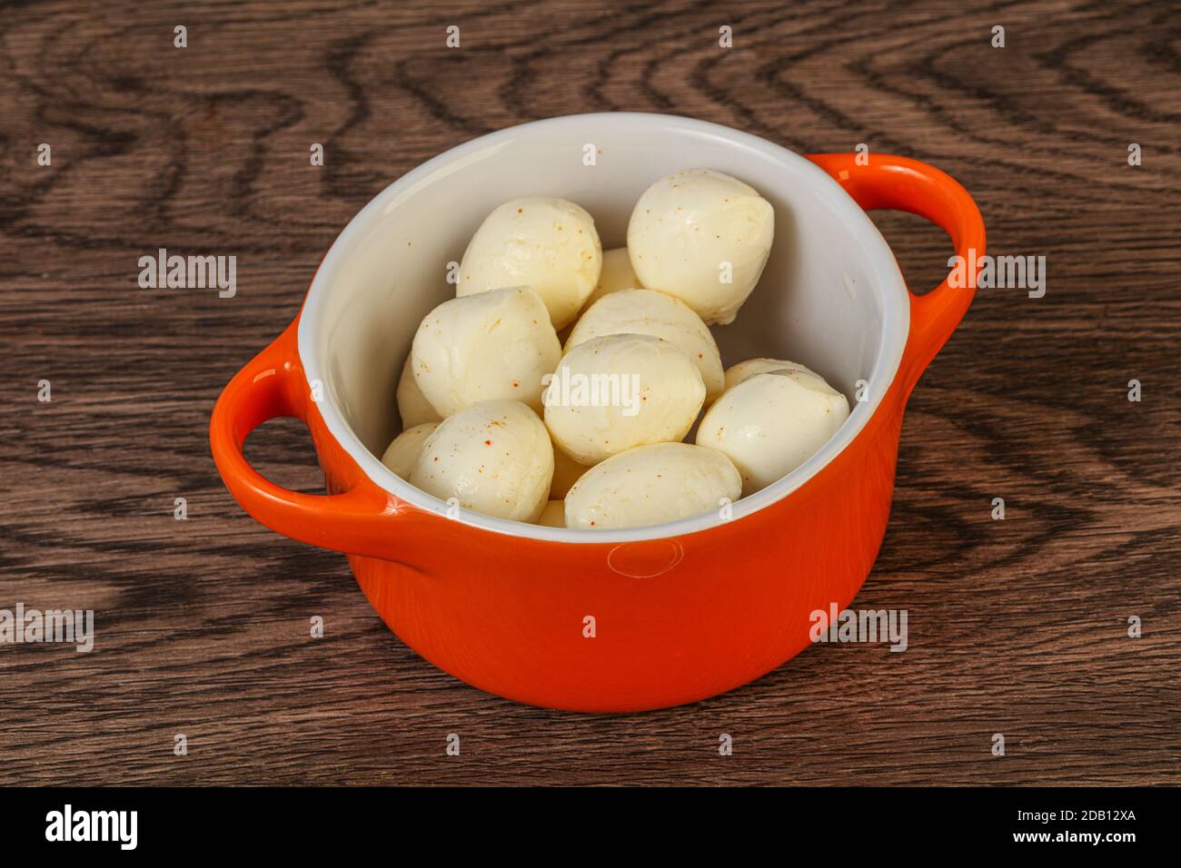 Natural tasty baby Mozarella cheese in the bowl Stock Photo - Alamy