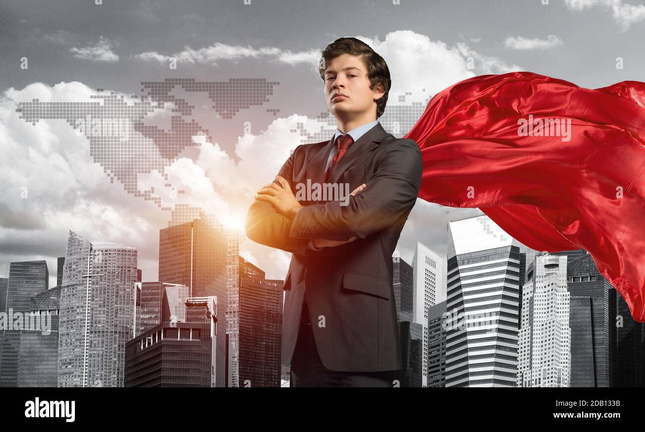 Concept of power and sucess with businessman superhero in big city ...