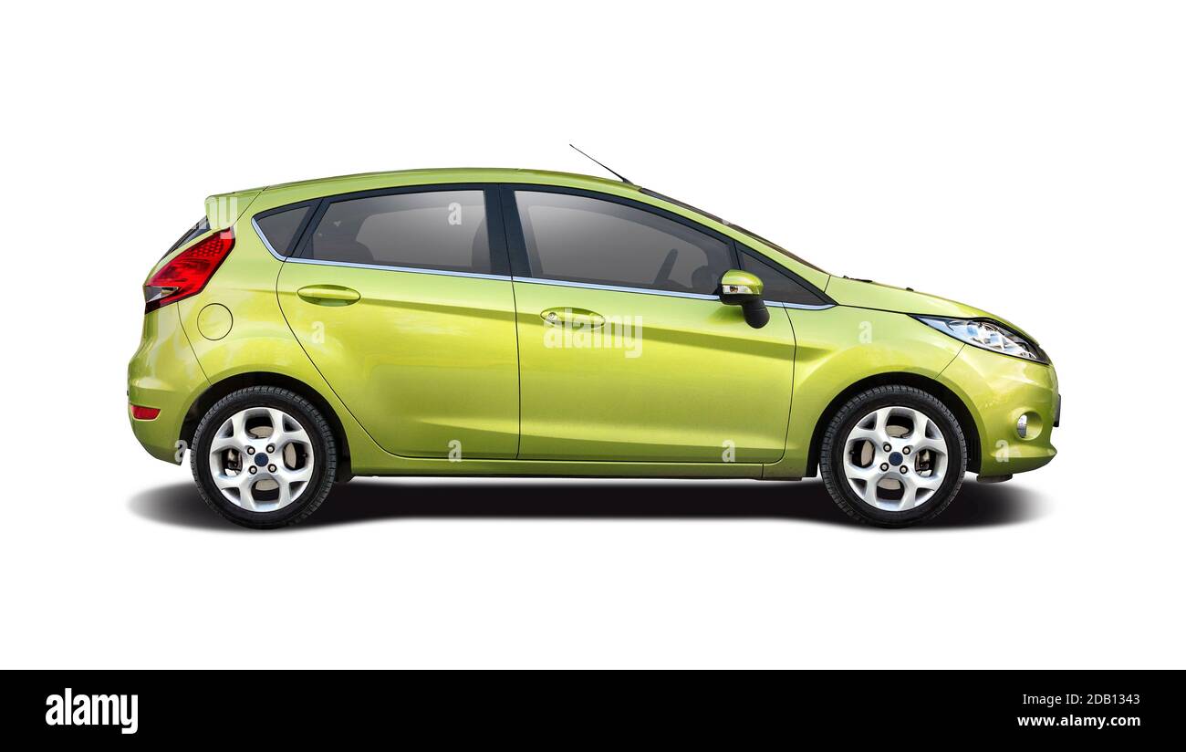Green hatchback city car isolated on white Stock Photo - Alamy