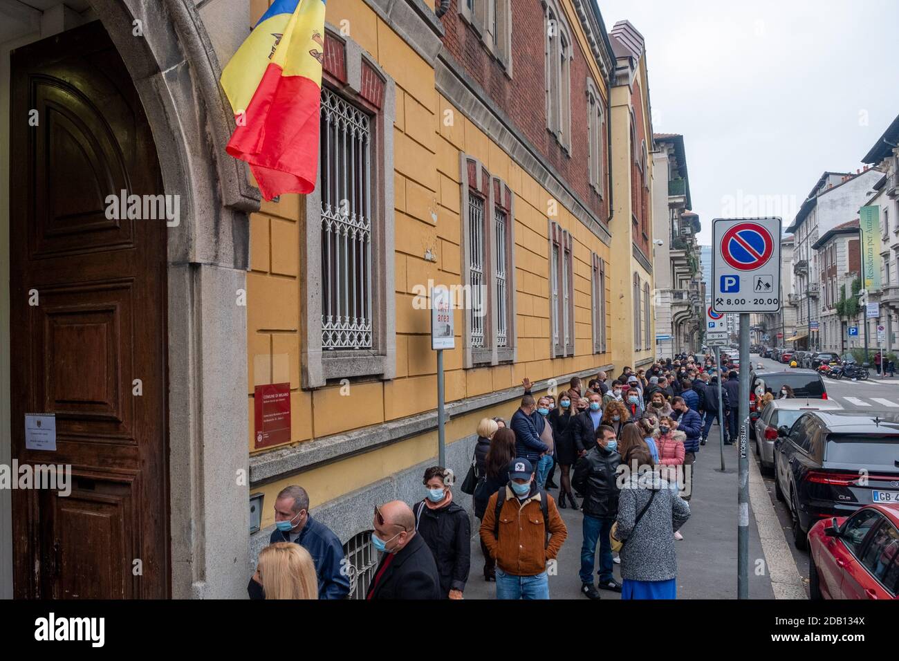 MILAN,Long queue of Moldovan citizens in front of and in the streets ...