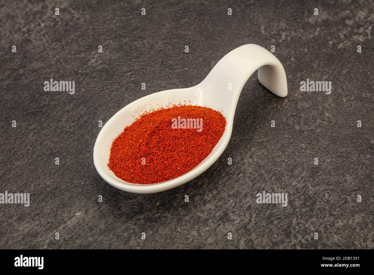 Dry paprika powder in the bowl for cooking Stock Photo - Alamy