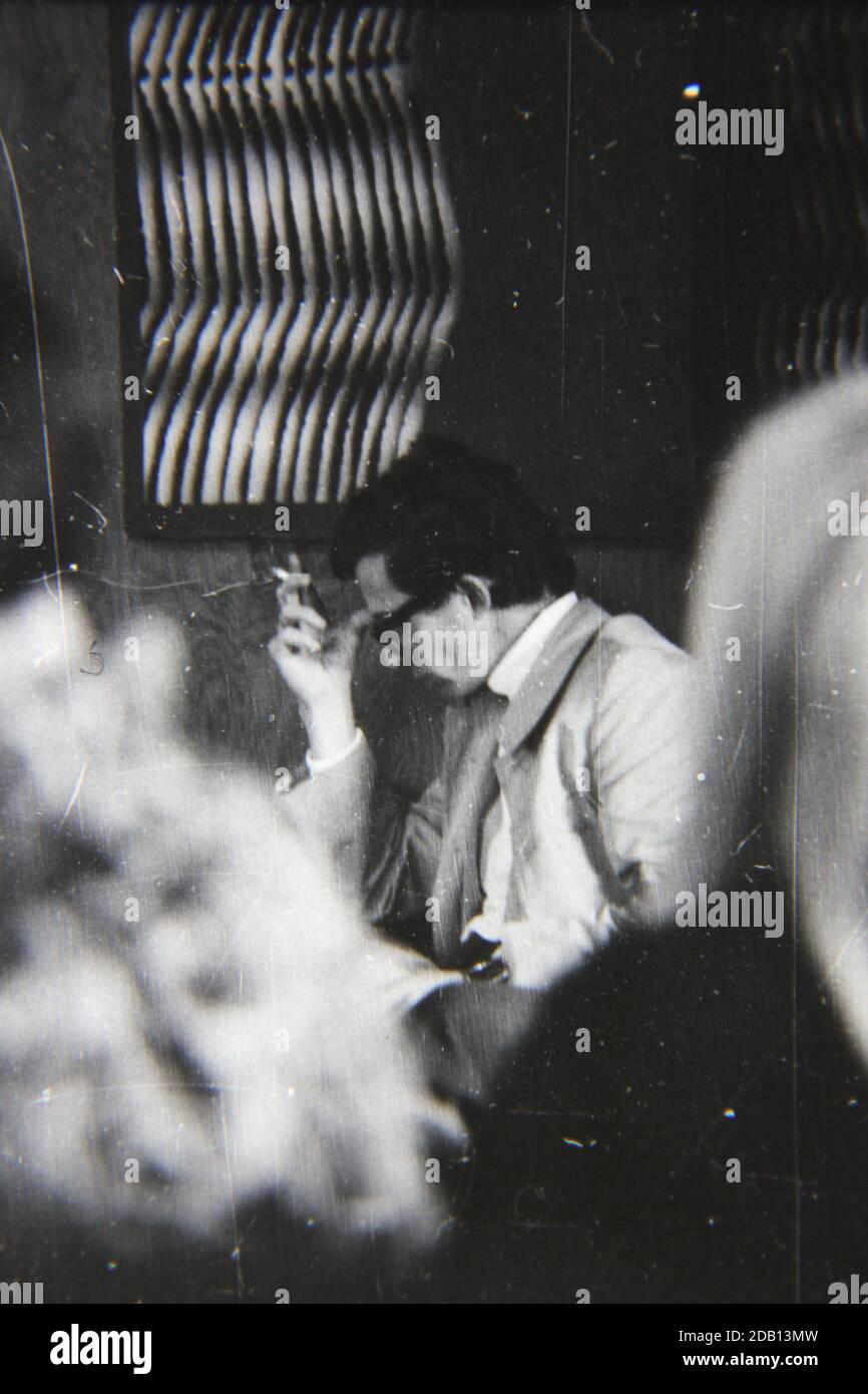Fine 1970s vintage black and white photography of a smoker smoking in ...
