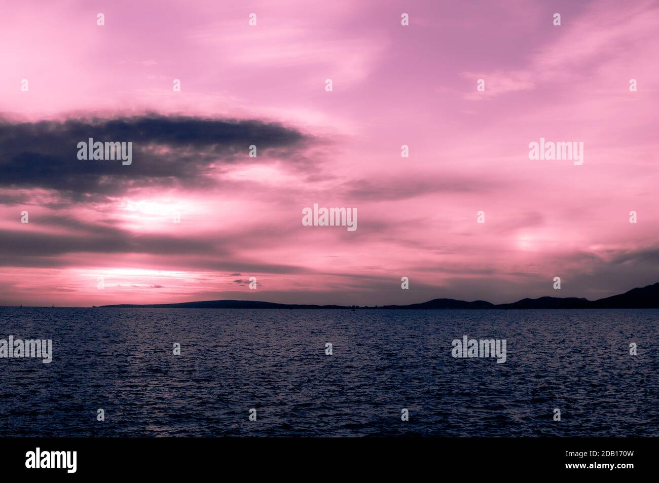 The breathtaking view of the purple sky above the ocean in Mallorca ...