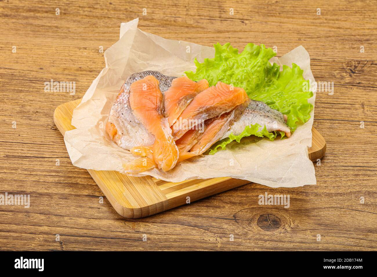 Sliced natural wild trout fillet over board Stock Photo - Alamy