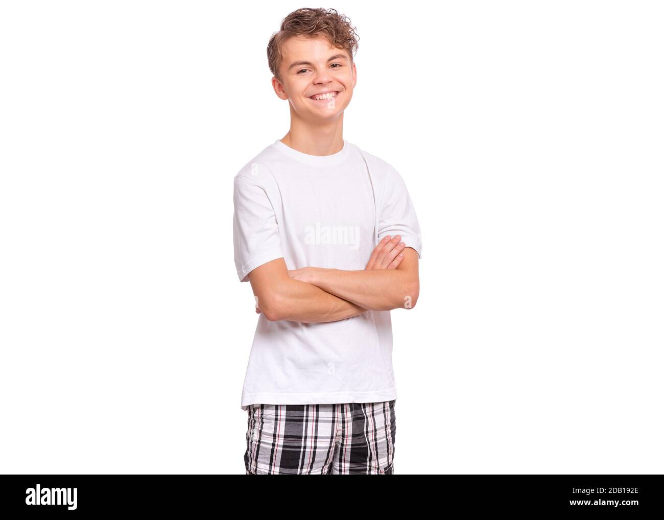 Handsome teen boy laughing looking very happy, isolated on white ...