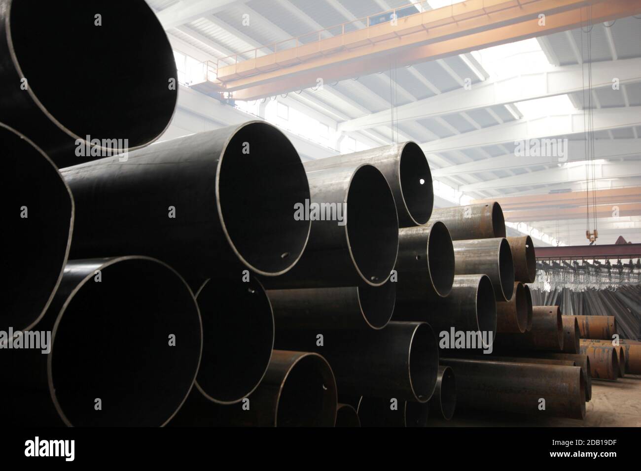 steel metal pipe stack inside factory Stock Photo - Alamy