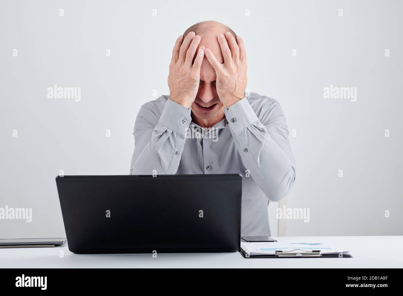 Stressed businessman almost crying Stock Photo - Alamy