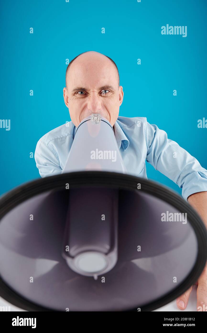 Person speaking megaphone in protest hi-res stock photography and ...