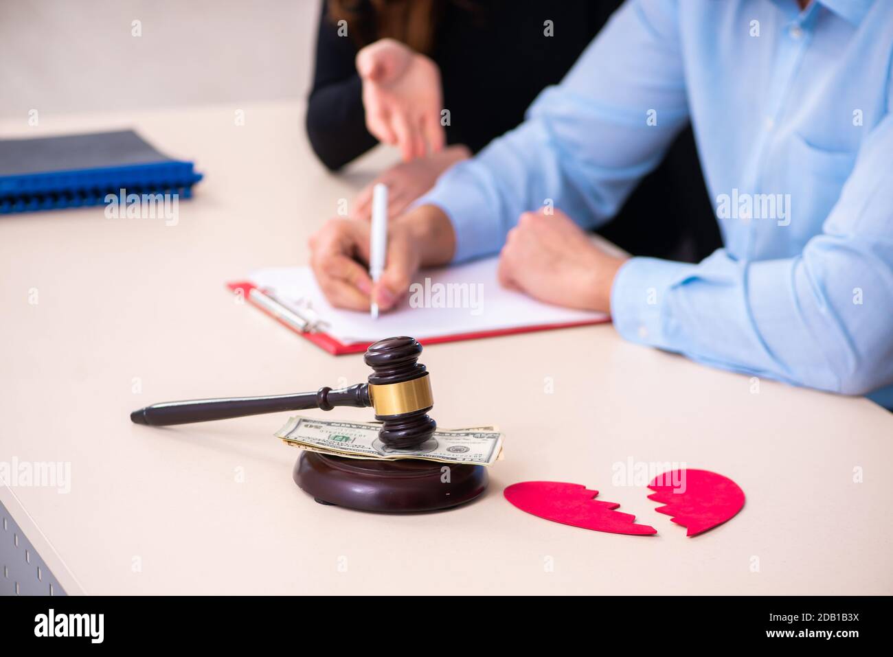 Couple divorcing in alimony concept Stock Photo - Alamy