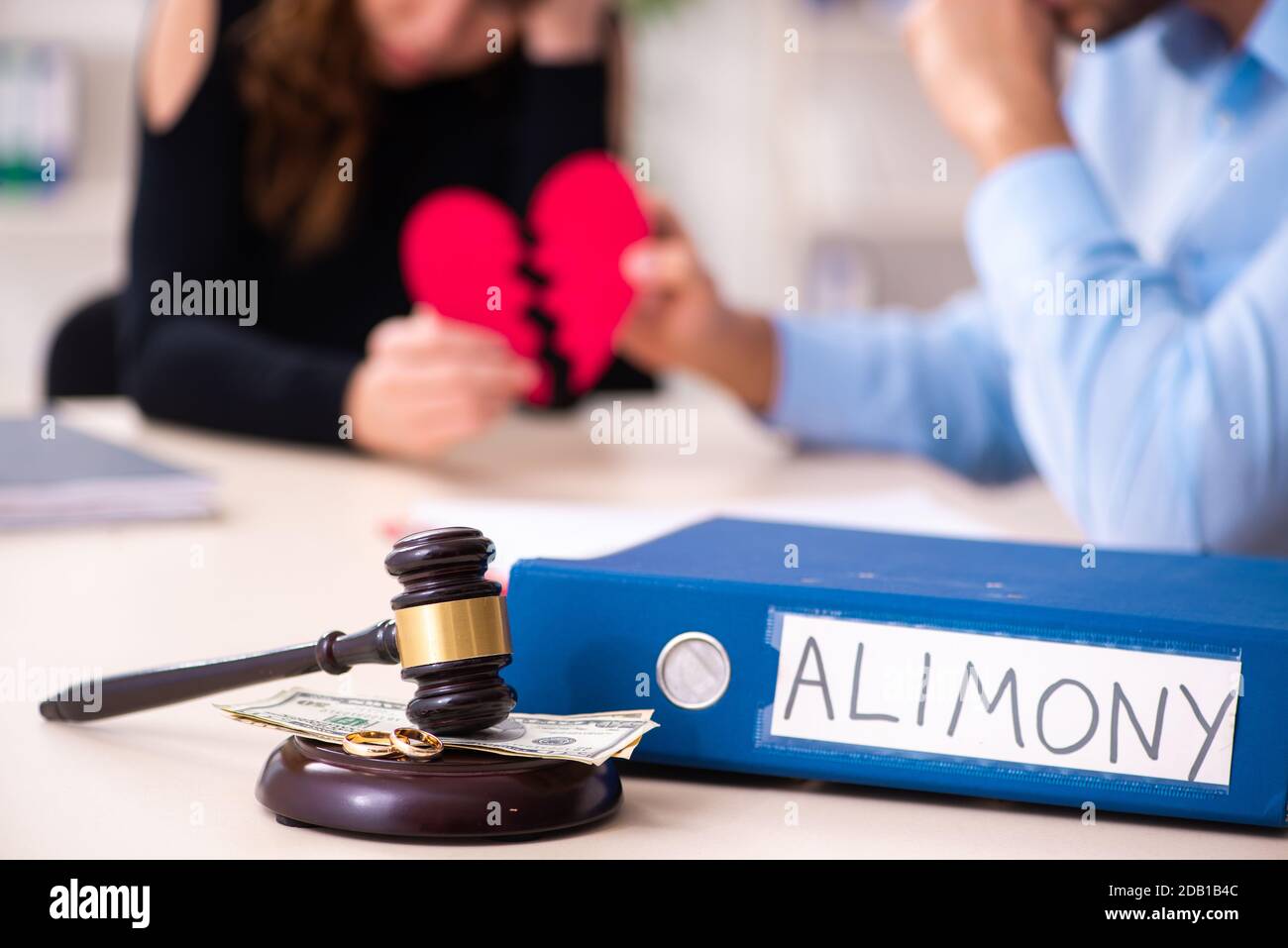 Couple divorcing in alimony concept Stock Photo - Alamy