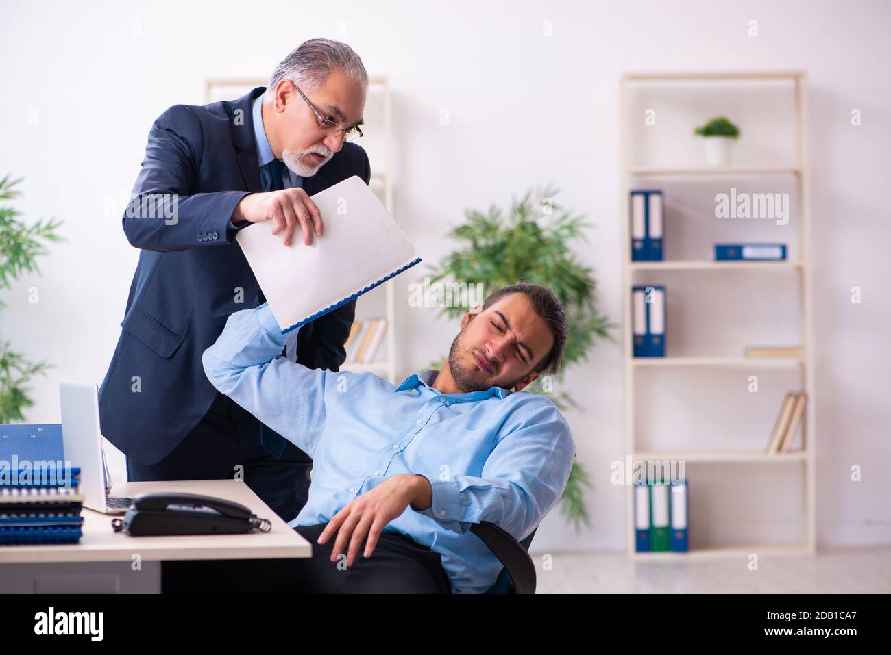 Funny lazy worker napping office hi-res stock photography and images ...