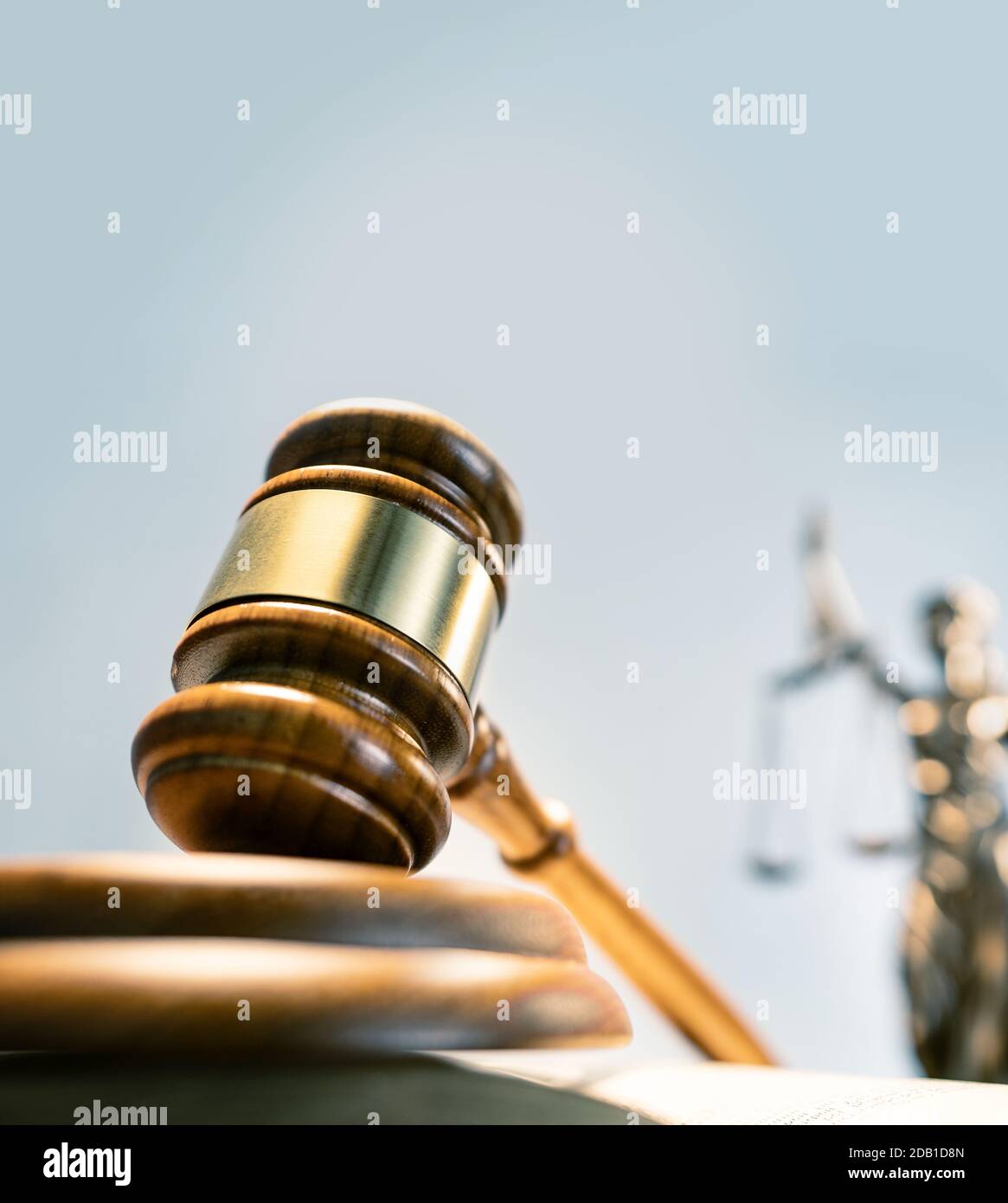 Statue of lady justice on bright background - Side view with copy space ...