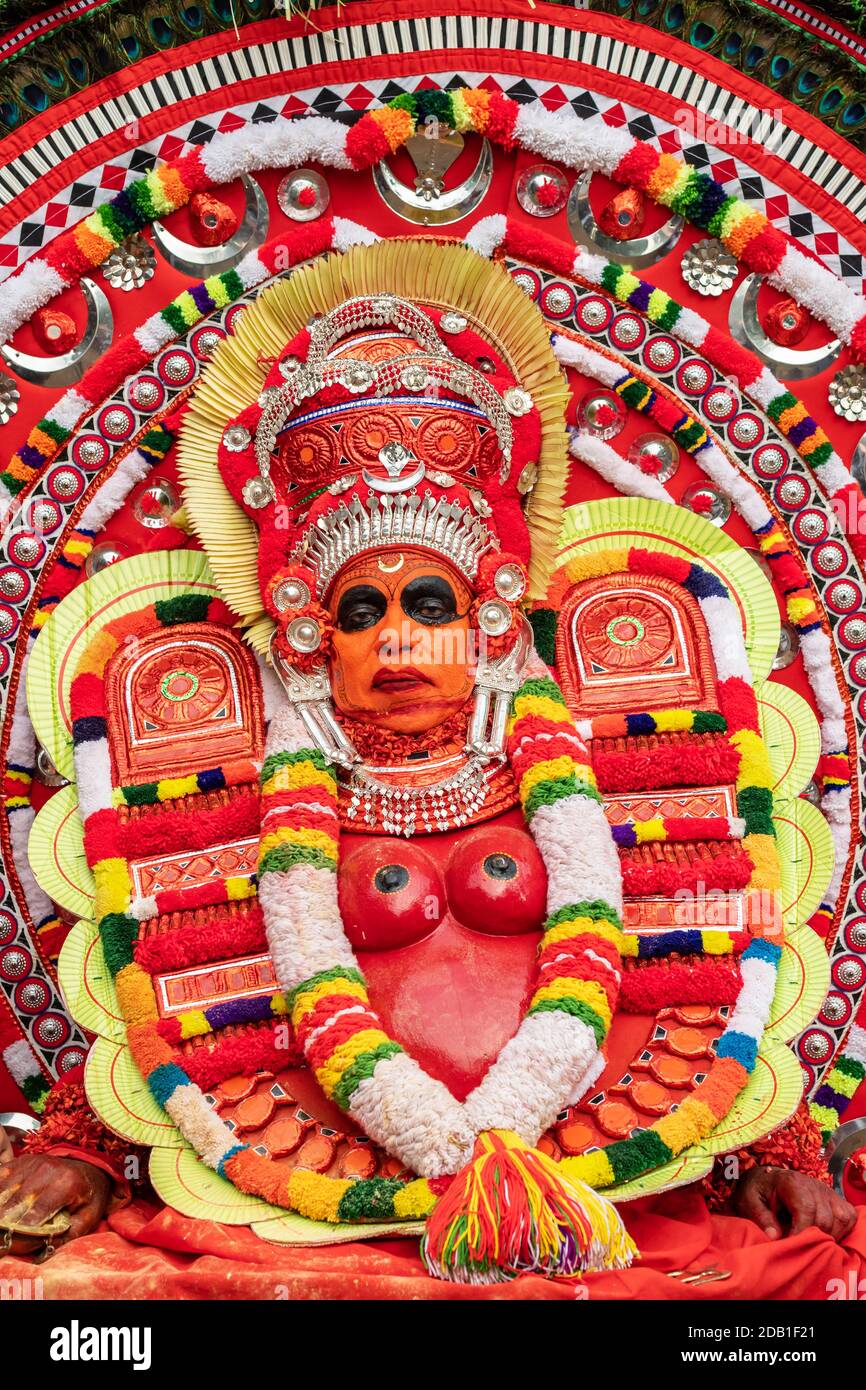 Theyyam artist perform during temple festival in Payyanur, Kerala ...