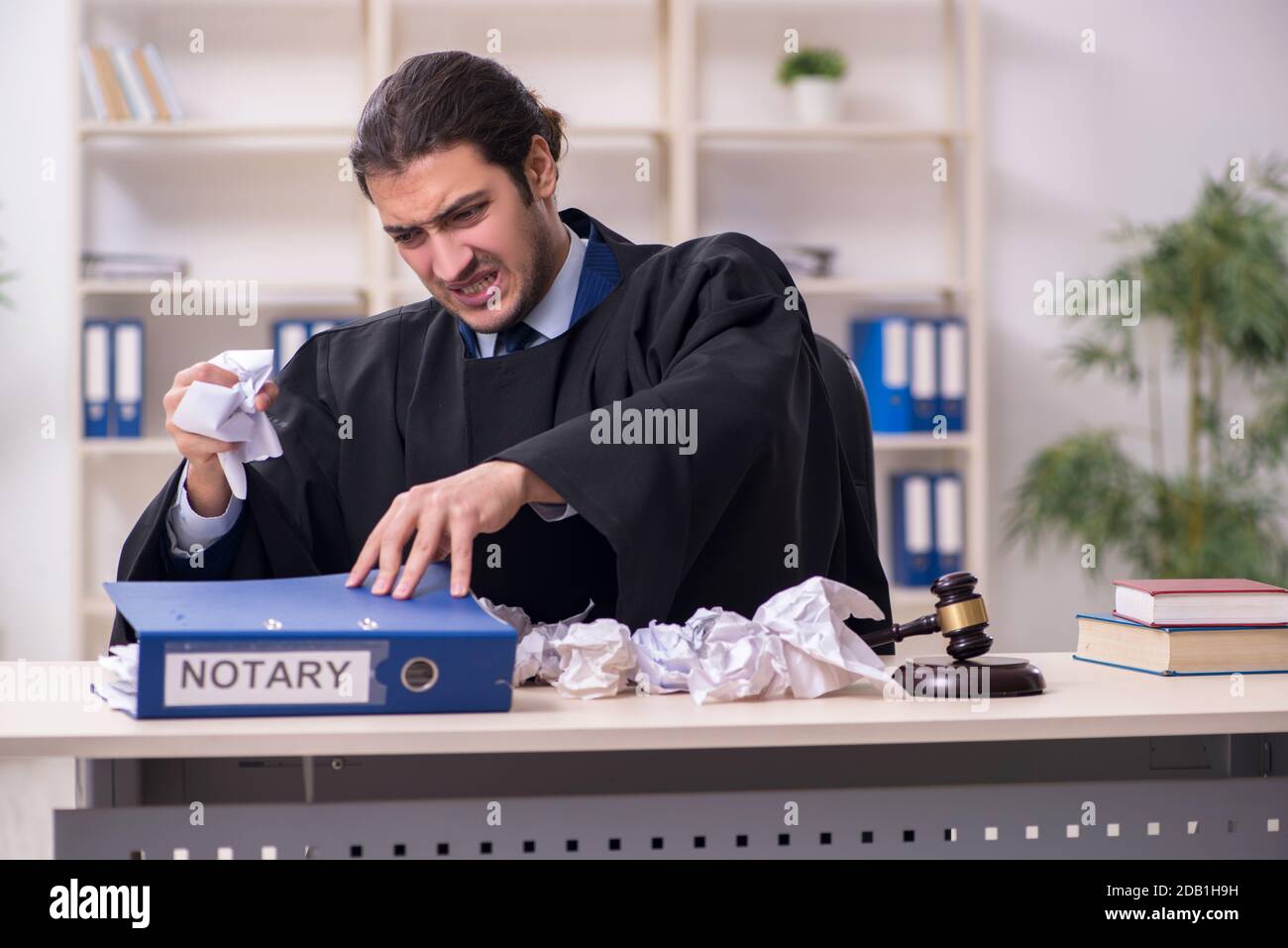 Young judge working in courthouse Stock Photo - Alamy