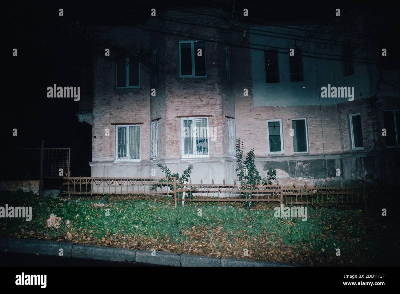 soviet building under a hard frontal flash at night scary atmospheric ...