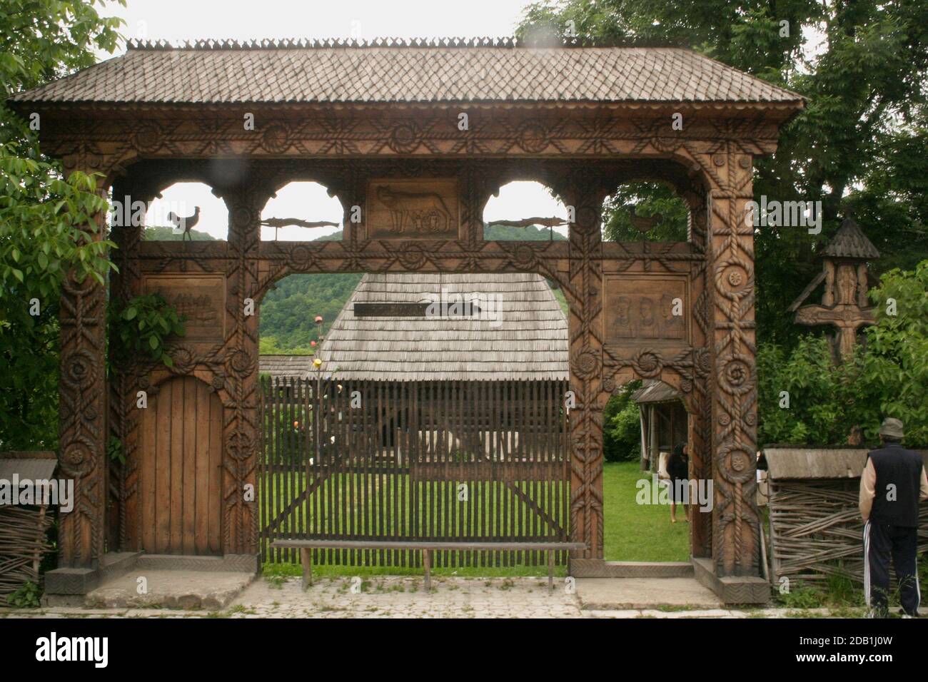 Dragomiresti, Maramures, Romania. Traditionally carved wooden gate at ...