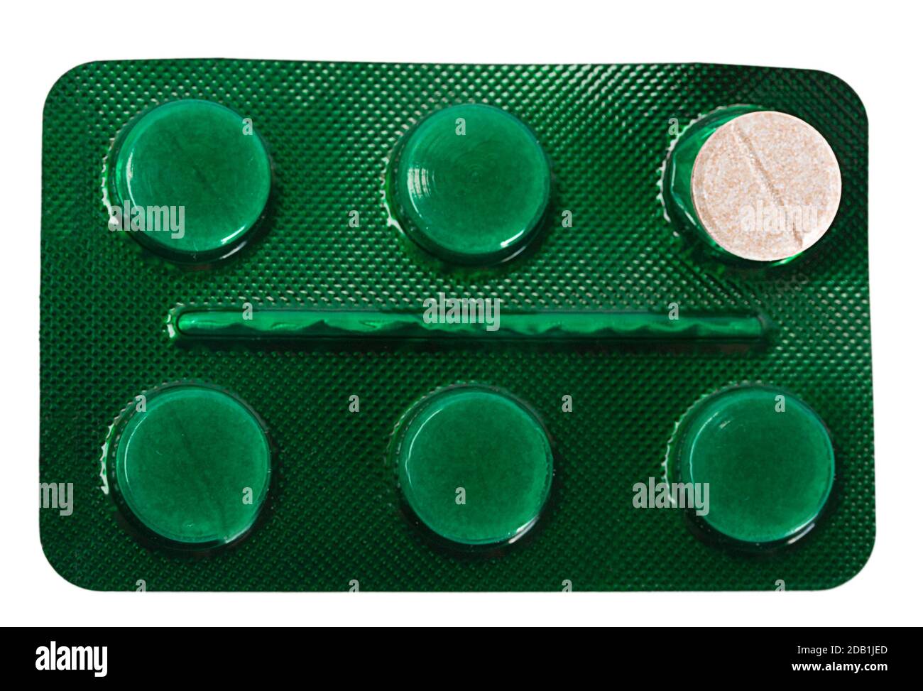 Packet of green tablets in a white background Stock Photo - Alamy