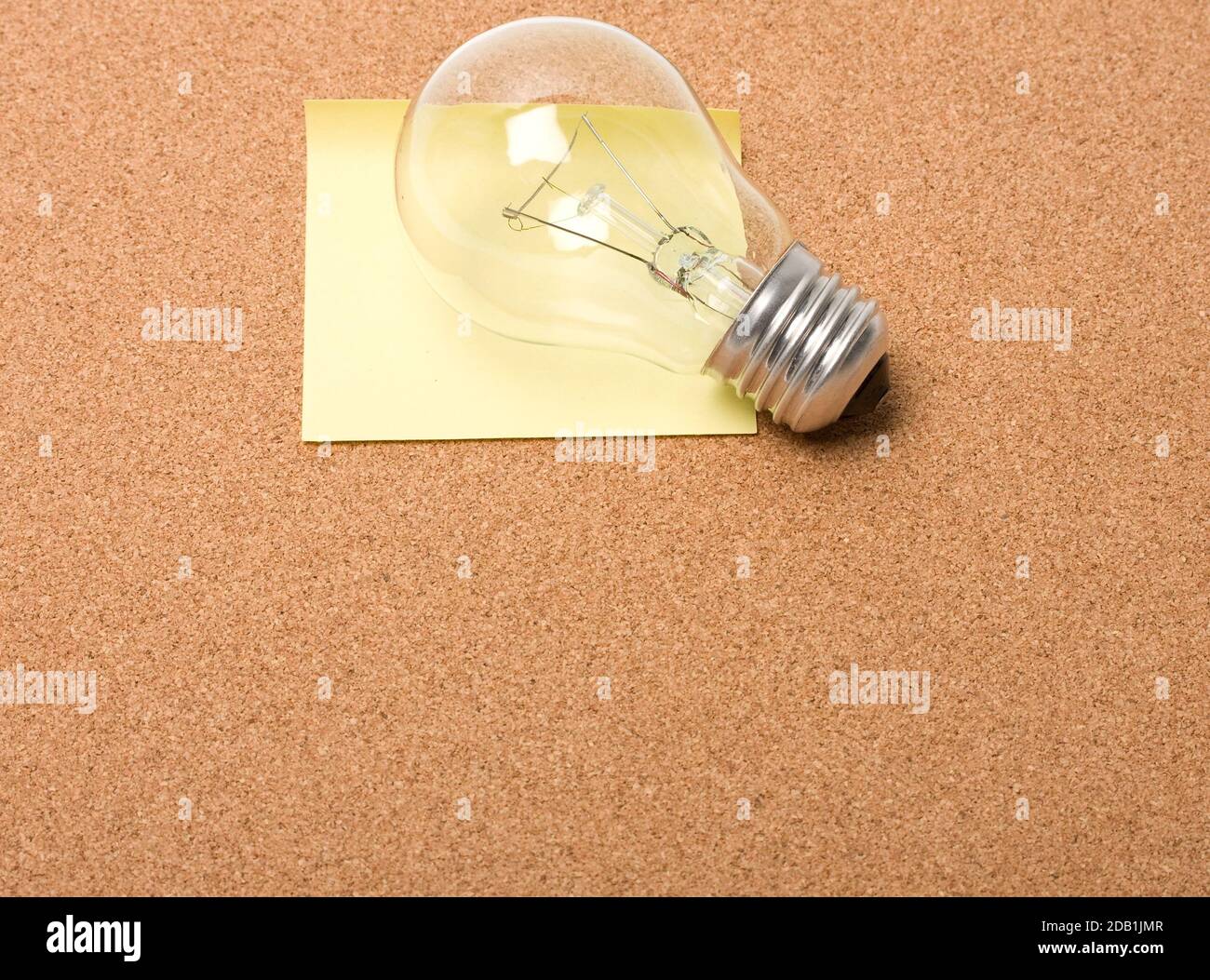 lamp bulb on cork bulletin board post it notes concept background Stock ...