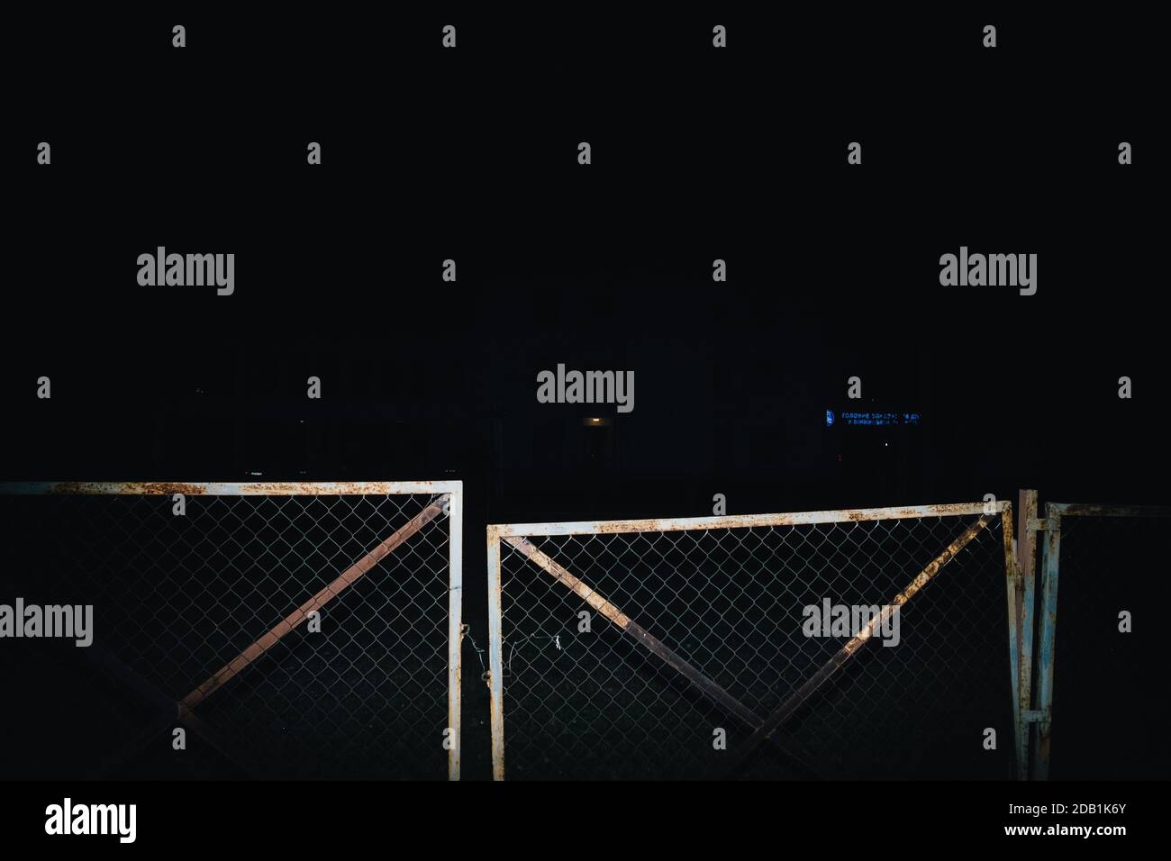 scary iron mesh fence photographed at night with a flash on the ...