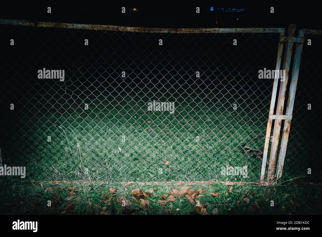 scary iron mesh fence photographed at night with a flash on the ...