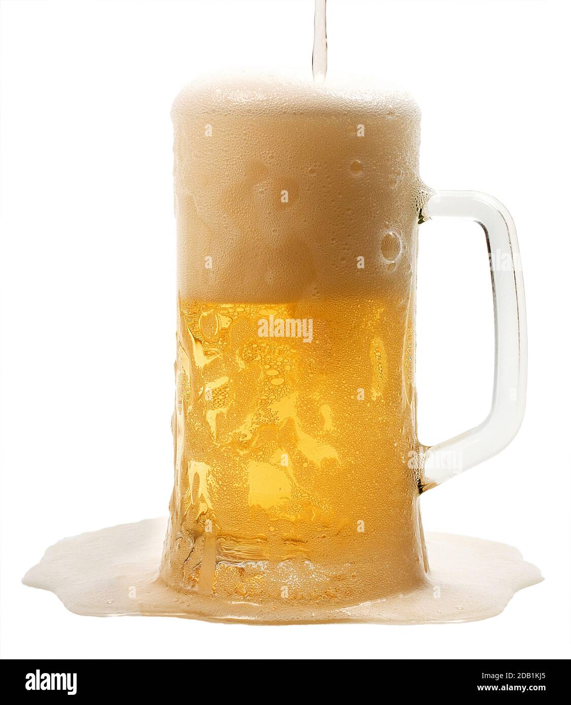 pour a mug of beer isolated on white background Stock Photo - Alamy