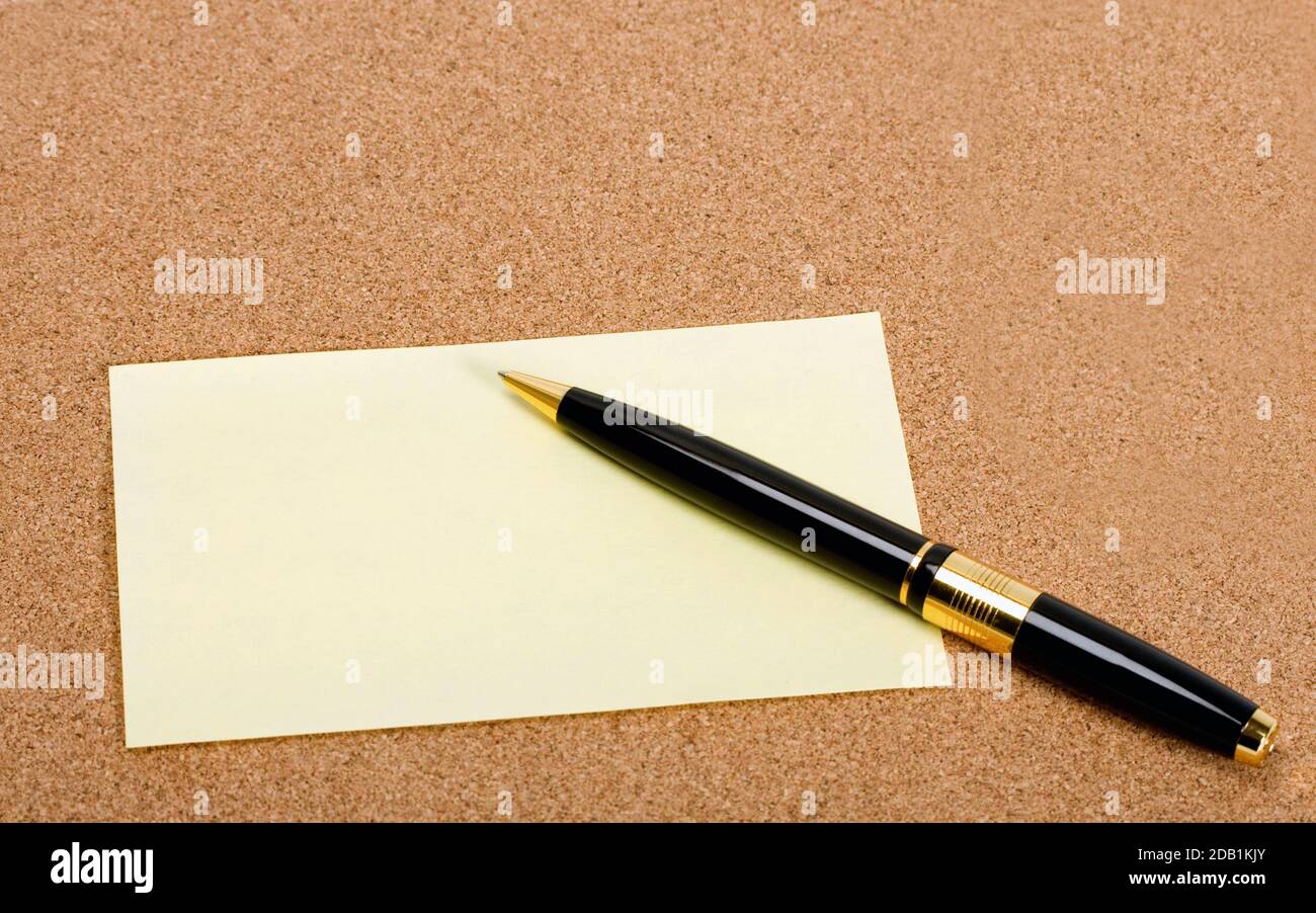 pen in post-it isolated on white background Stock Photo - Alamy