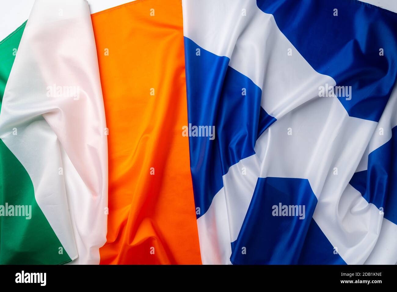 Flags of Scotland and Ireland folded together Stock Photo - Alamy