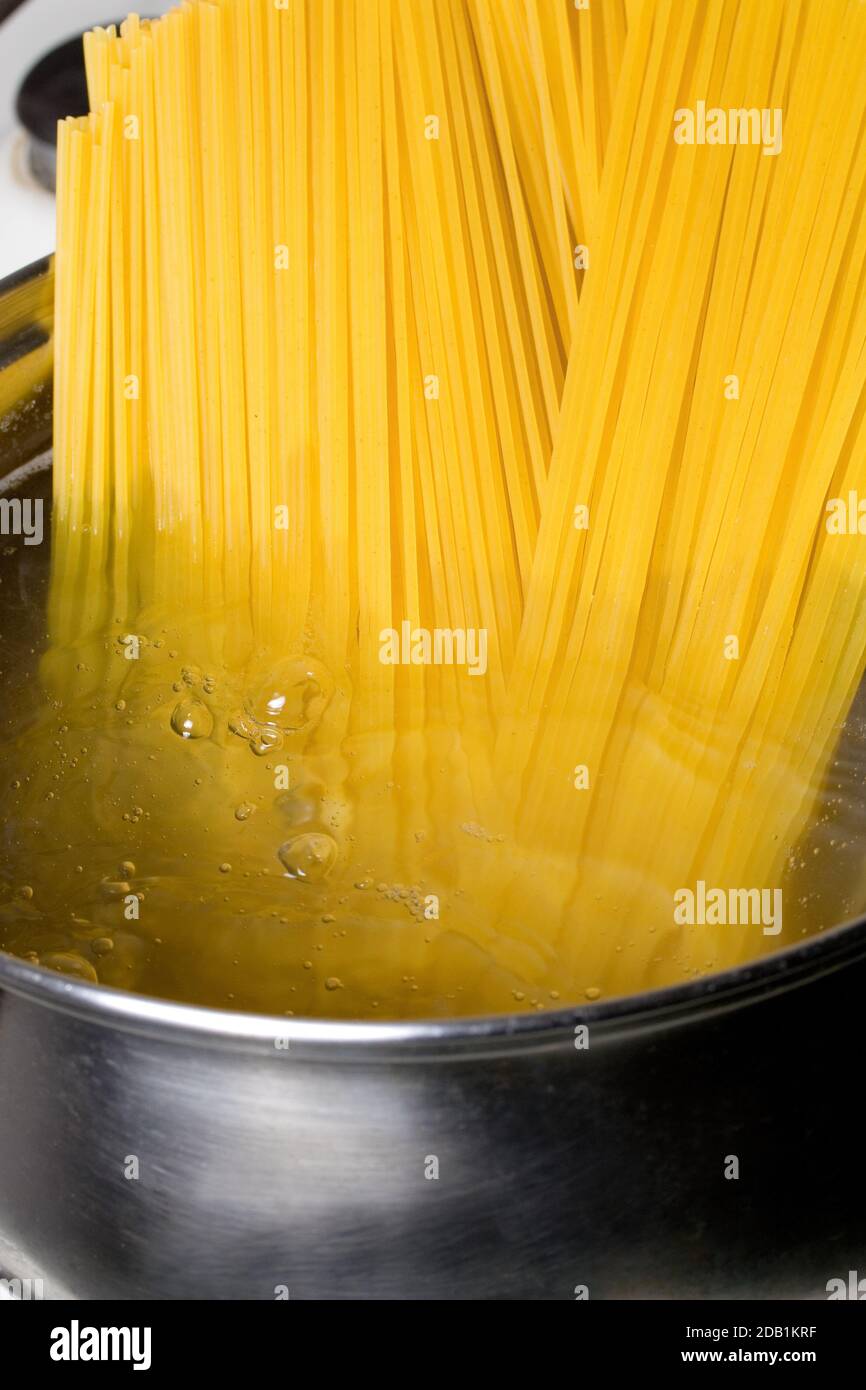 spaghetti in Stainless steel pot Stock Photo - Alamy