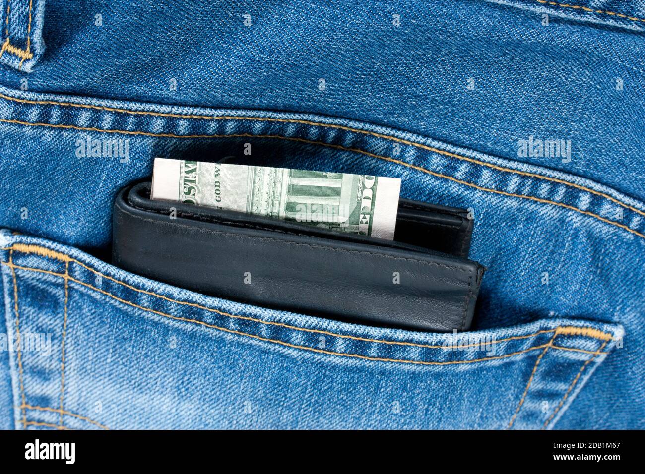 wallet money pocket jeans background Stock Photo - Alamy