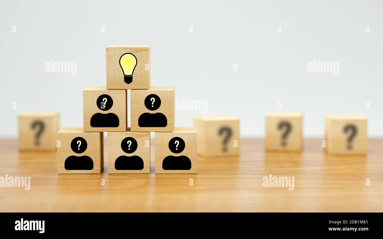 cubes showing a brainstorming session on wooden floor and white ...