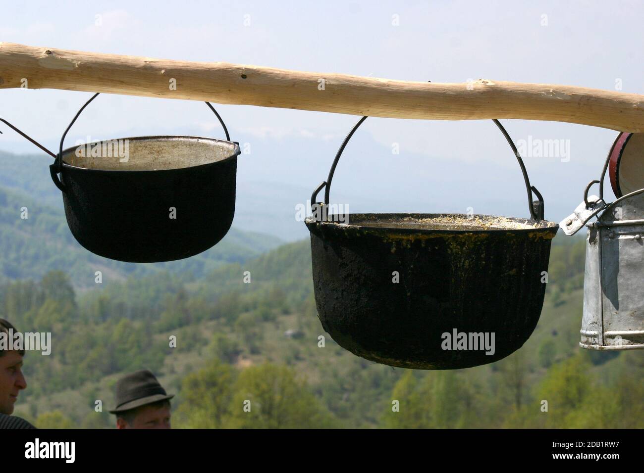 Hanging iron cauldrons used for cooking over open fire in Romania's ...